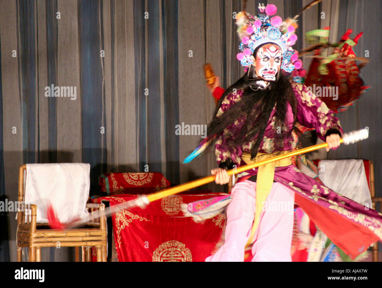 Actor of the Chengdu Opera representing the leader of a local tribe ...