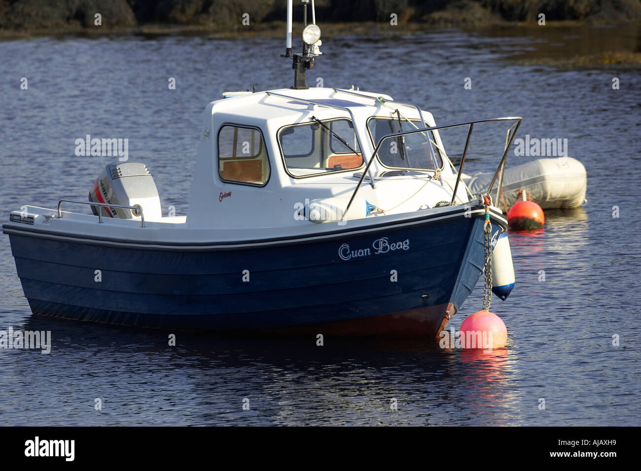 small pleasure craft at anchor in bunbeg harbour and clady river ...
