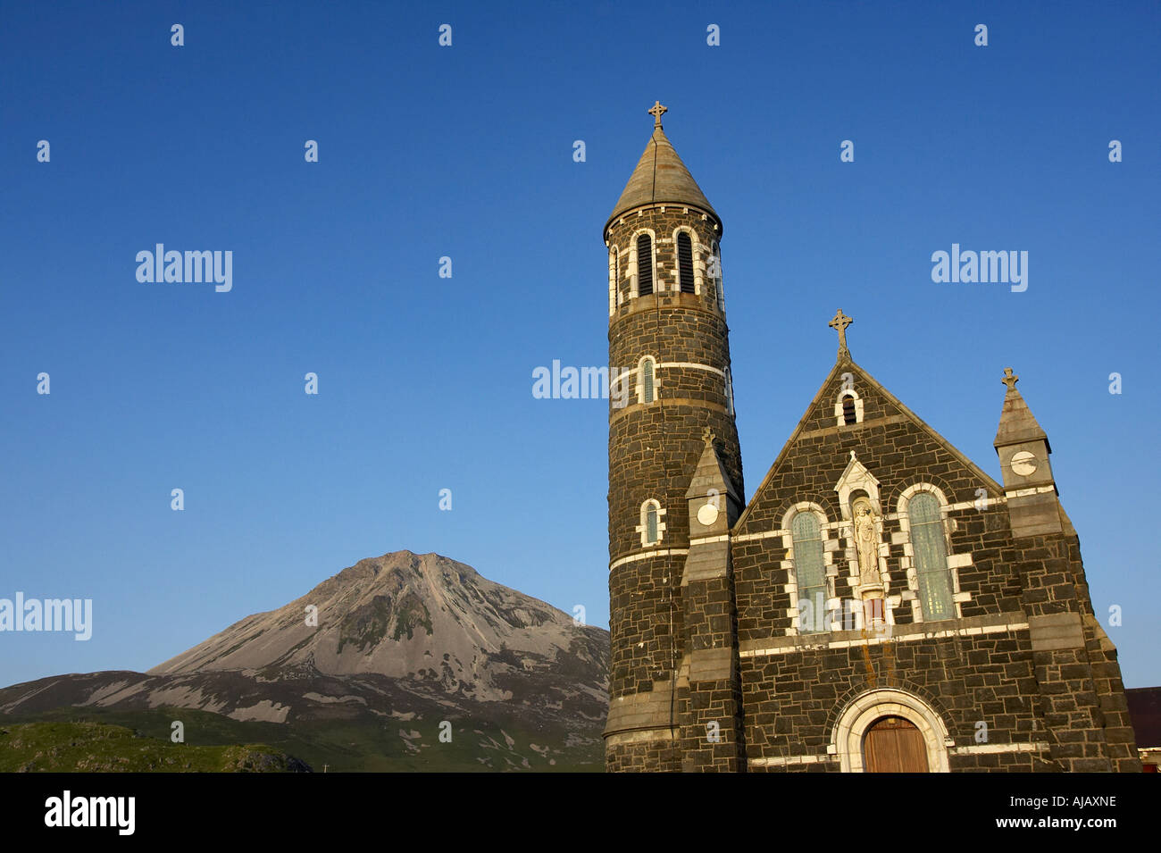 dunlewey roman catholic church of the sacred heart against a blue sky ...