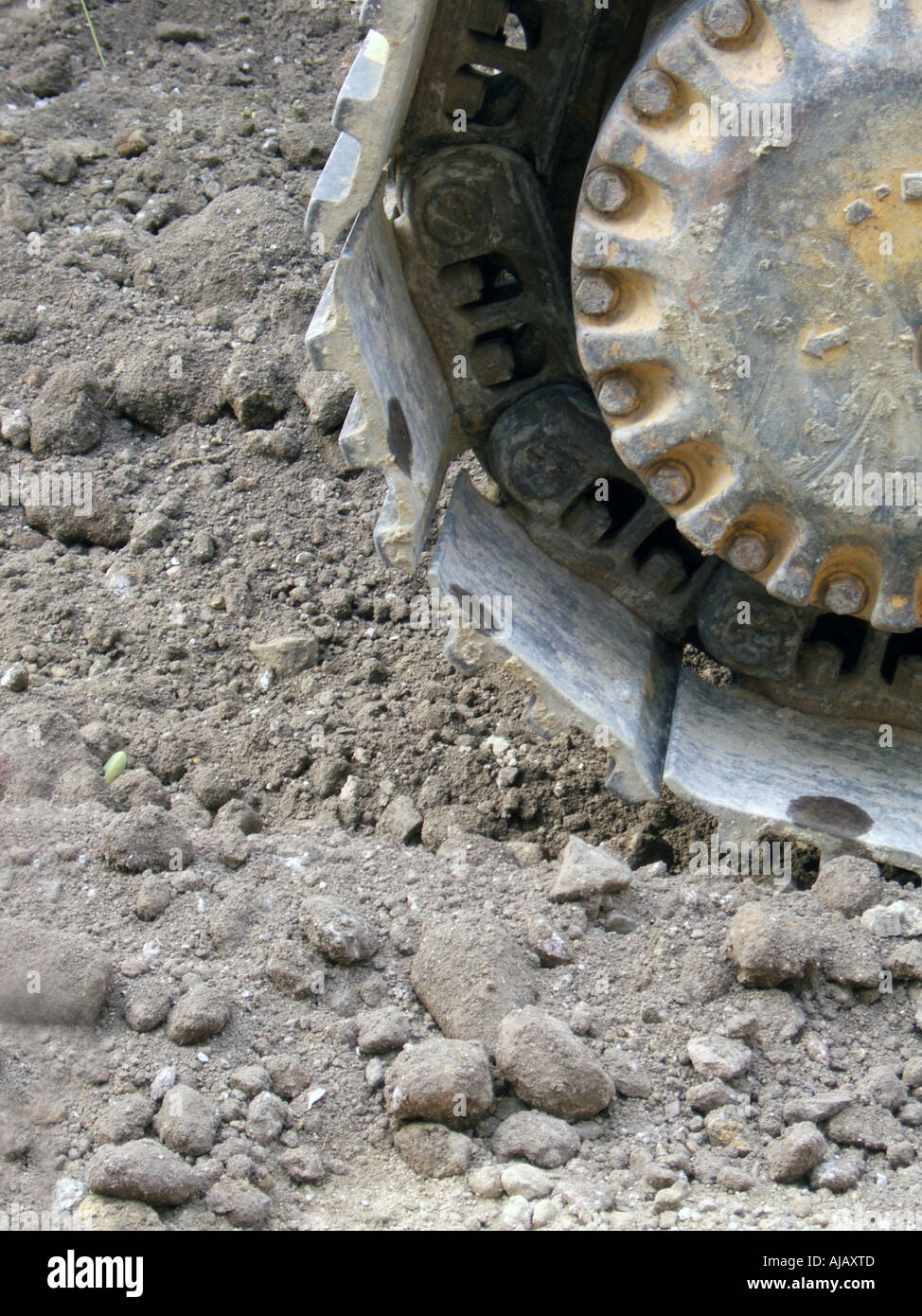 excavator digger wheel tracks Stock Photo - Alamy