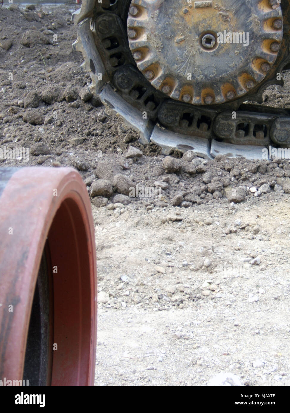 excavator digger wheel tracks Stock Photo - Alamy