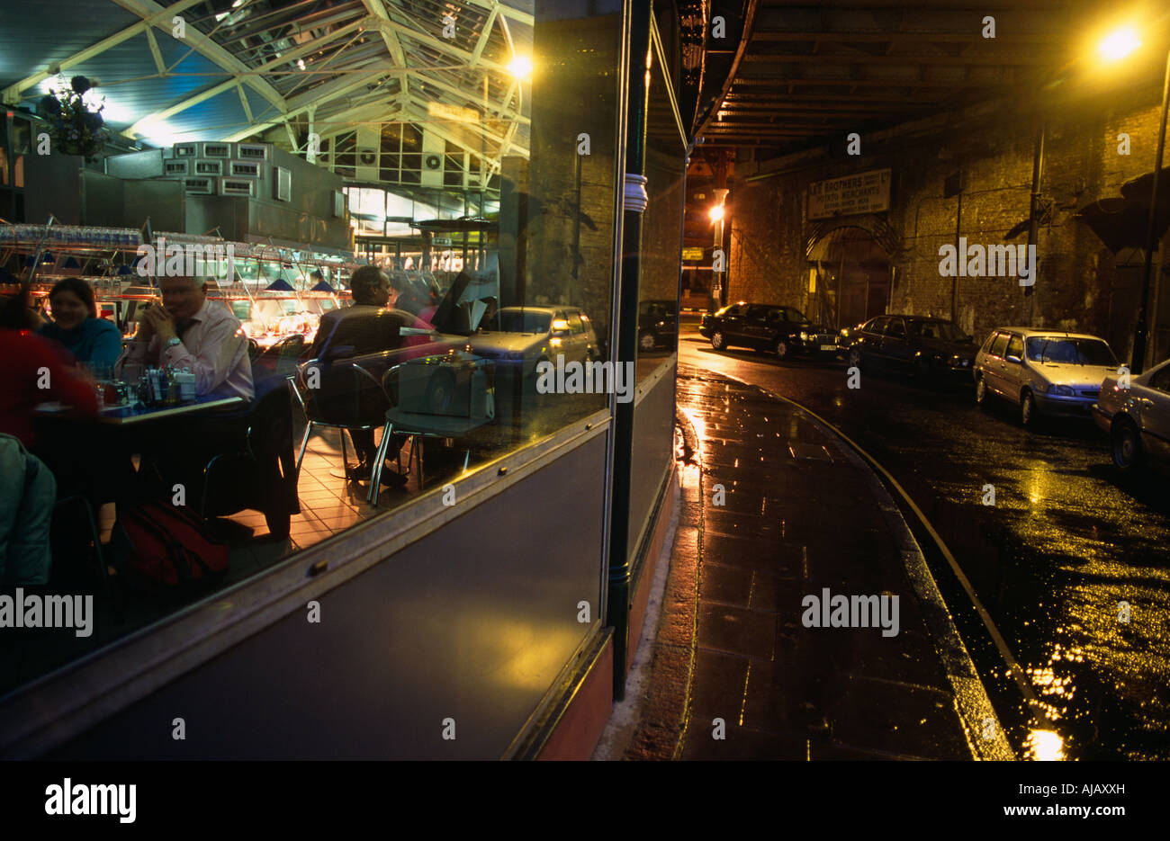 Groups of friends enjoy each other s company dining at Fish restaurant ...