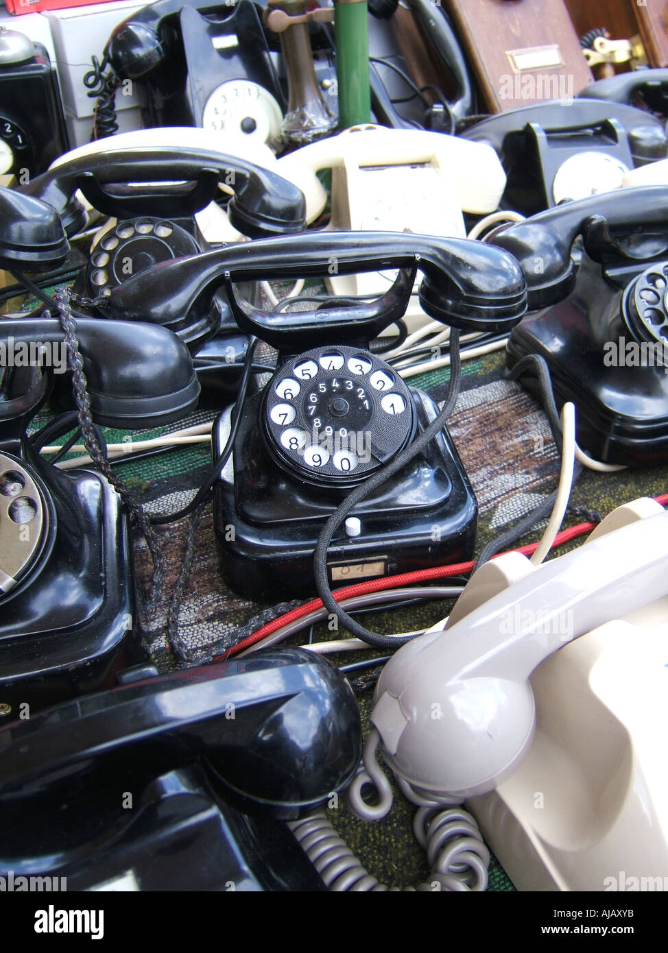 old style telephone on bric a brac antique market stall Stock Photo - Alamy