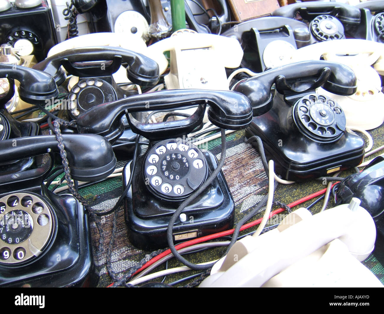 old style telephone on bric a brac antique market stall Stock Photo - Alamy