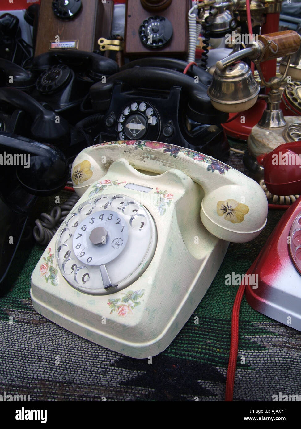old style telephone on bric a brac antique market stall Stock Photo - Alamy