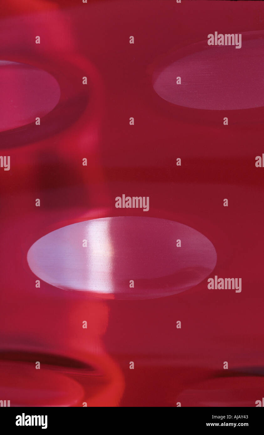 Red oval glass shapes Stock Photo - Alamy