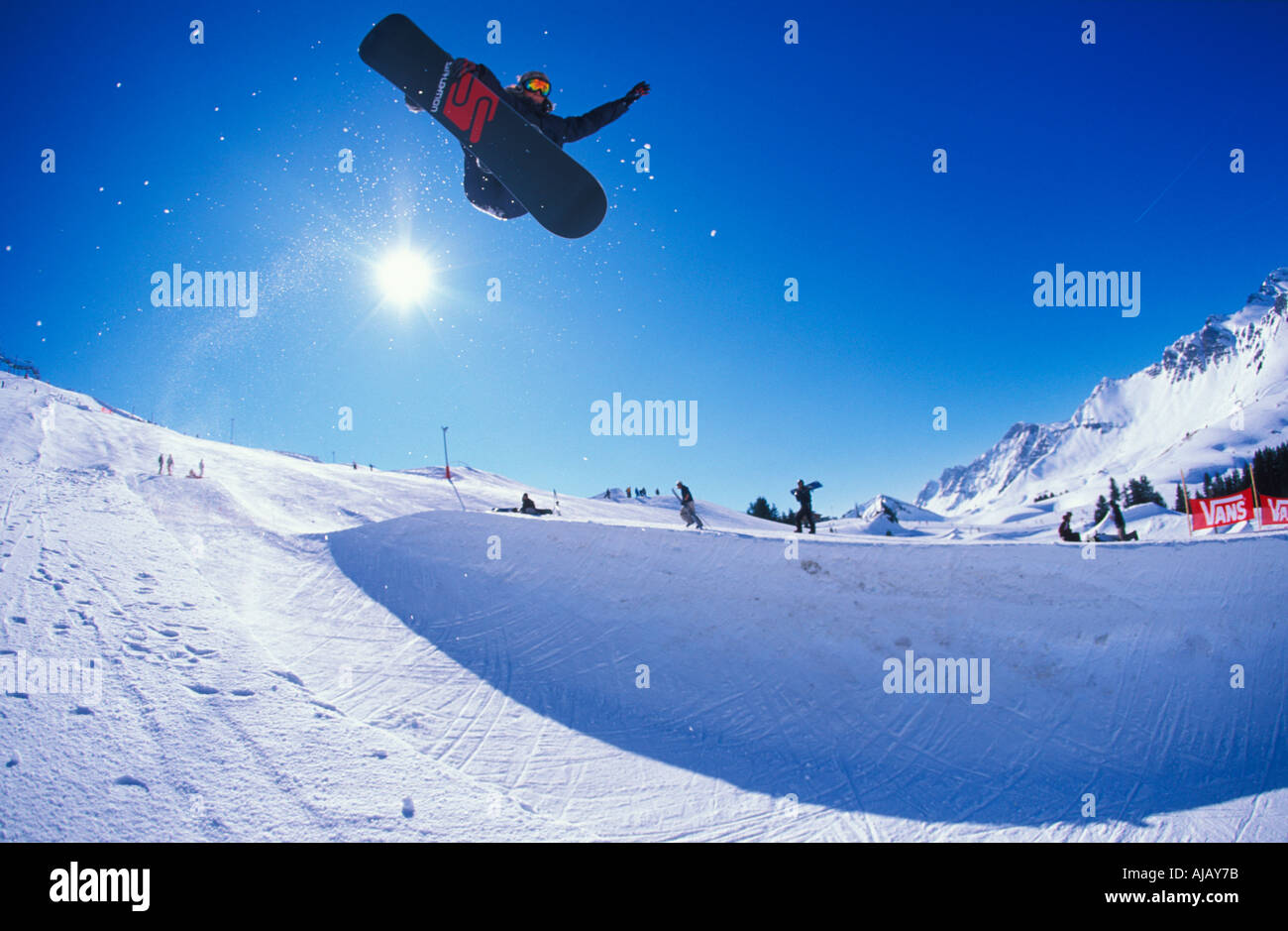 Female snowboard in halfpipe Wide angle action Stock Photo - Alamy