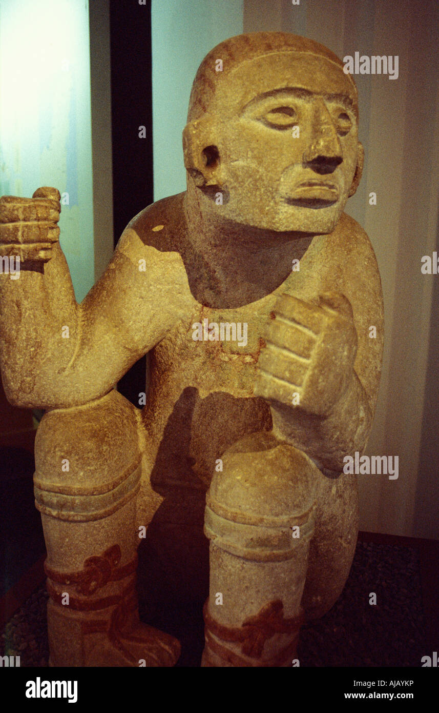 Seated Mayan figure, stone carving, Yucatan, Mexico Stock Photo - Alamy