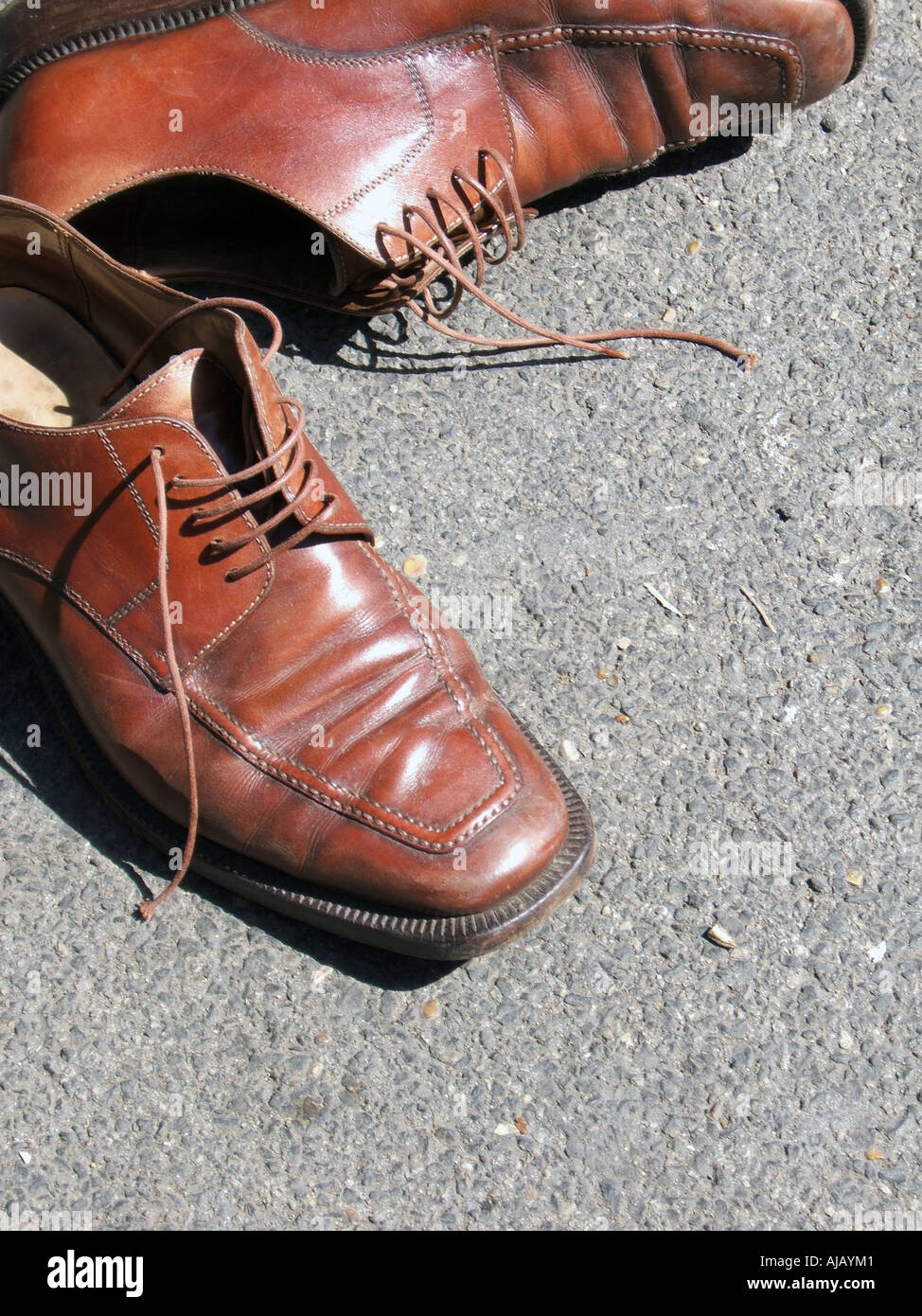 Abstract odd unusual floor discarded shoe left on street dirty hi-res ...