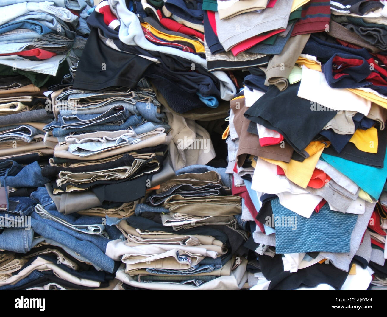 pile of folded clothes Stock Photo - Alamy