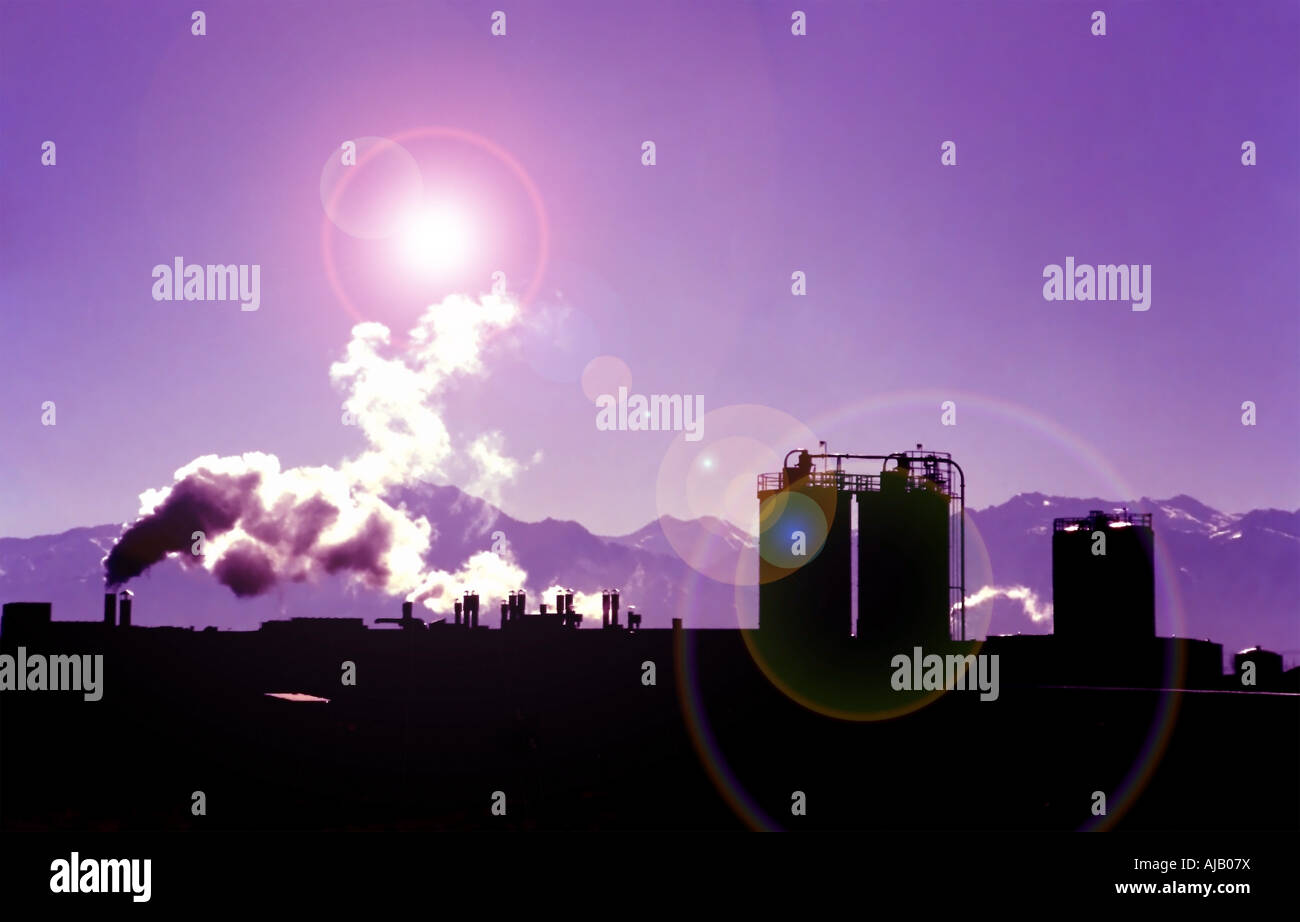 A dramatically backlit image of an american processing plant. The ...