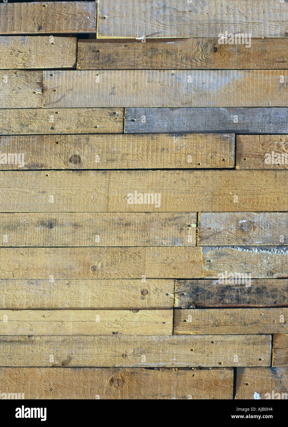 wooden wall made with numbered planks Stock Photo - Alamy