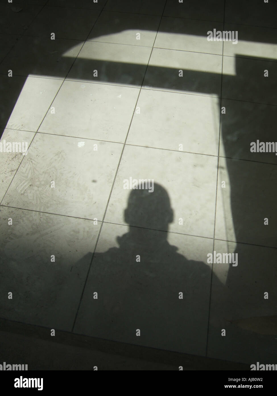 Mans shadow on building hi-res stock photography and images - Alamy