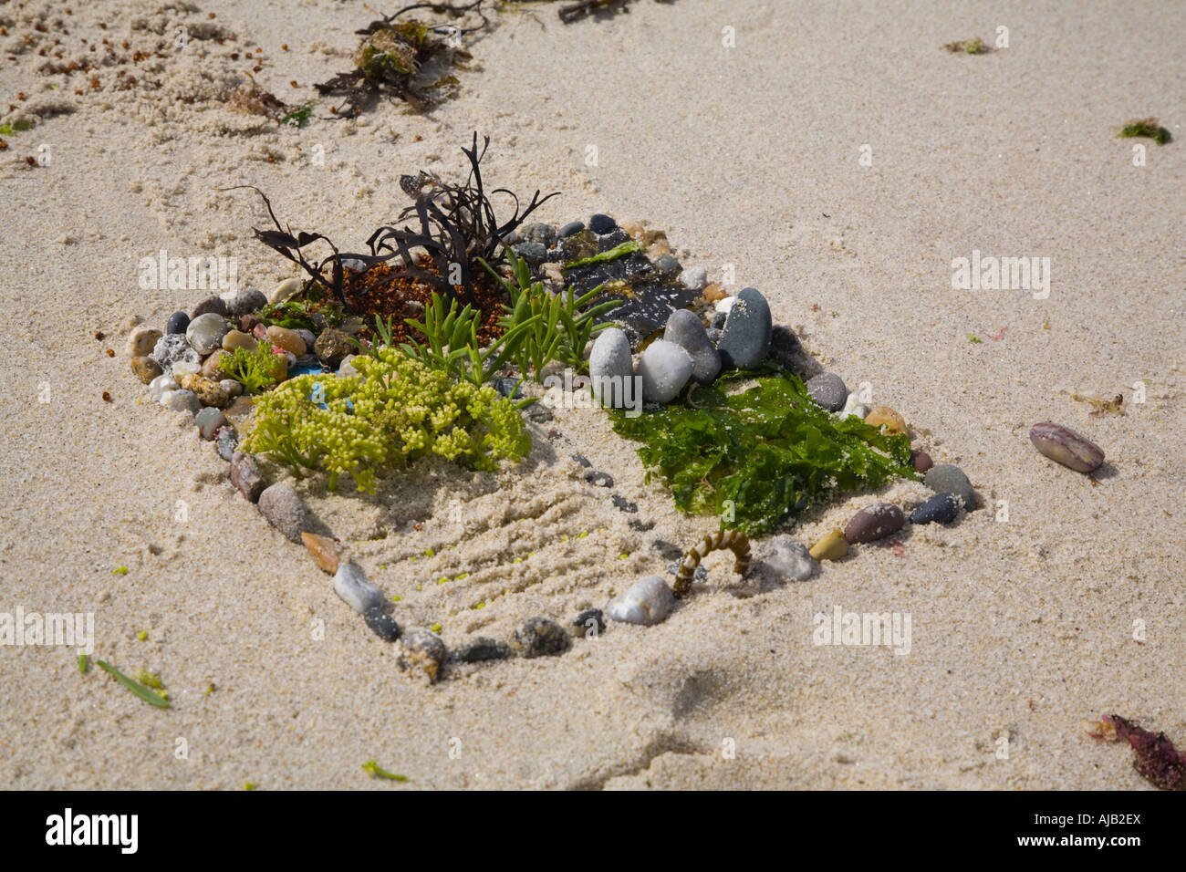 Small sandcastle type house and garden on a Scilly Isle beach Stock ...
