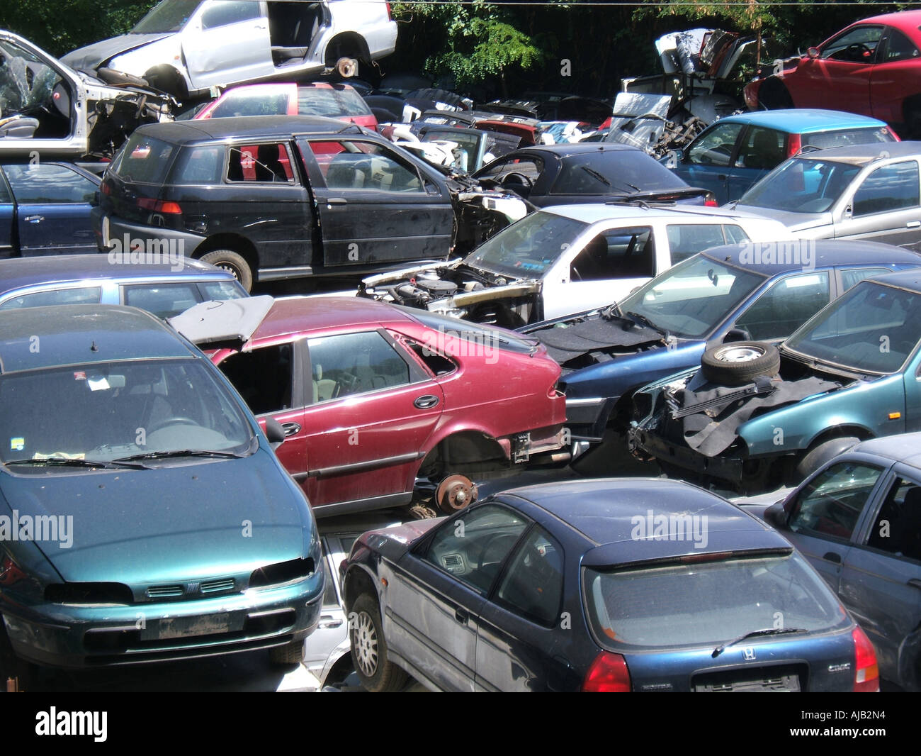 Piled scrapped cars hi-res stock photography and images - Alamy