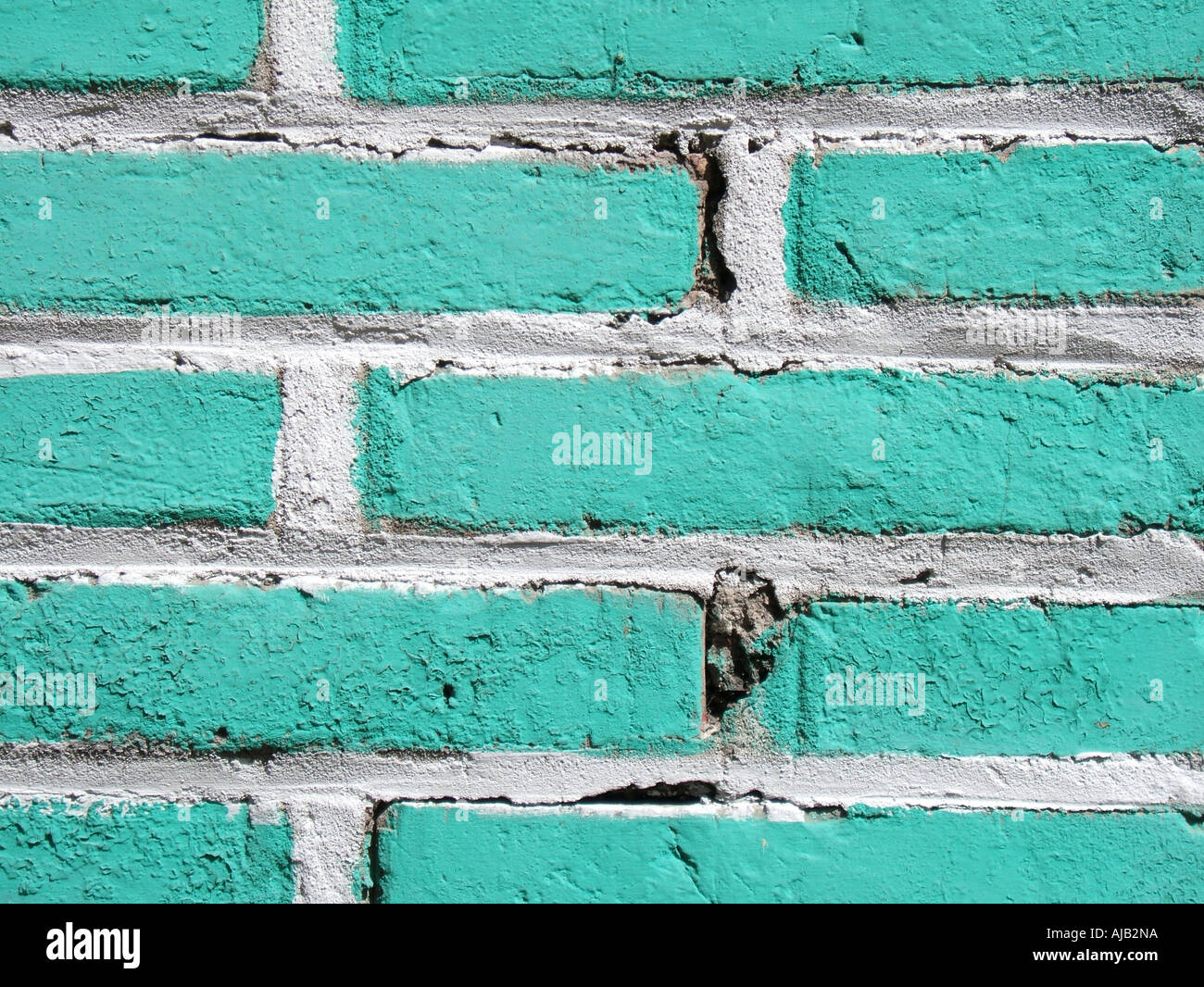 wall with bricks painted green Stock Photo - Alamy