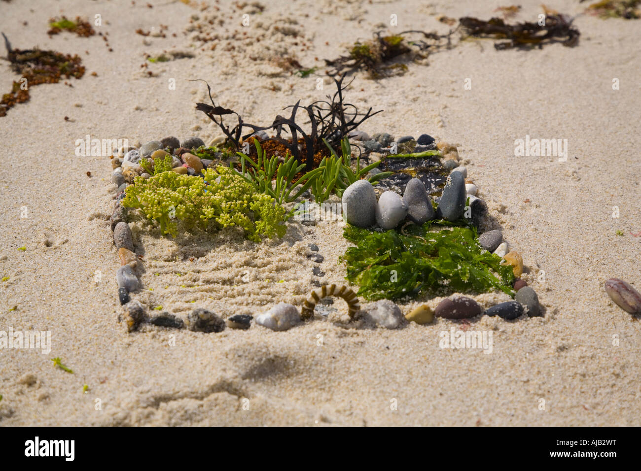 Small sandcastle type house and garden on a Scilly Isle beach Stock ...