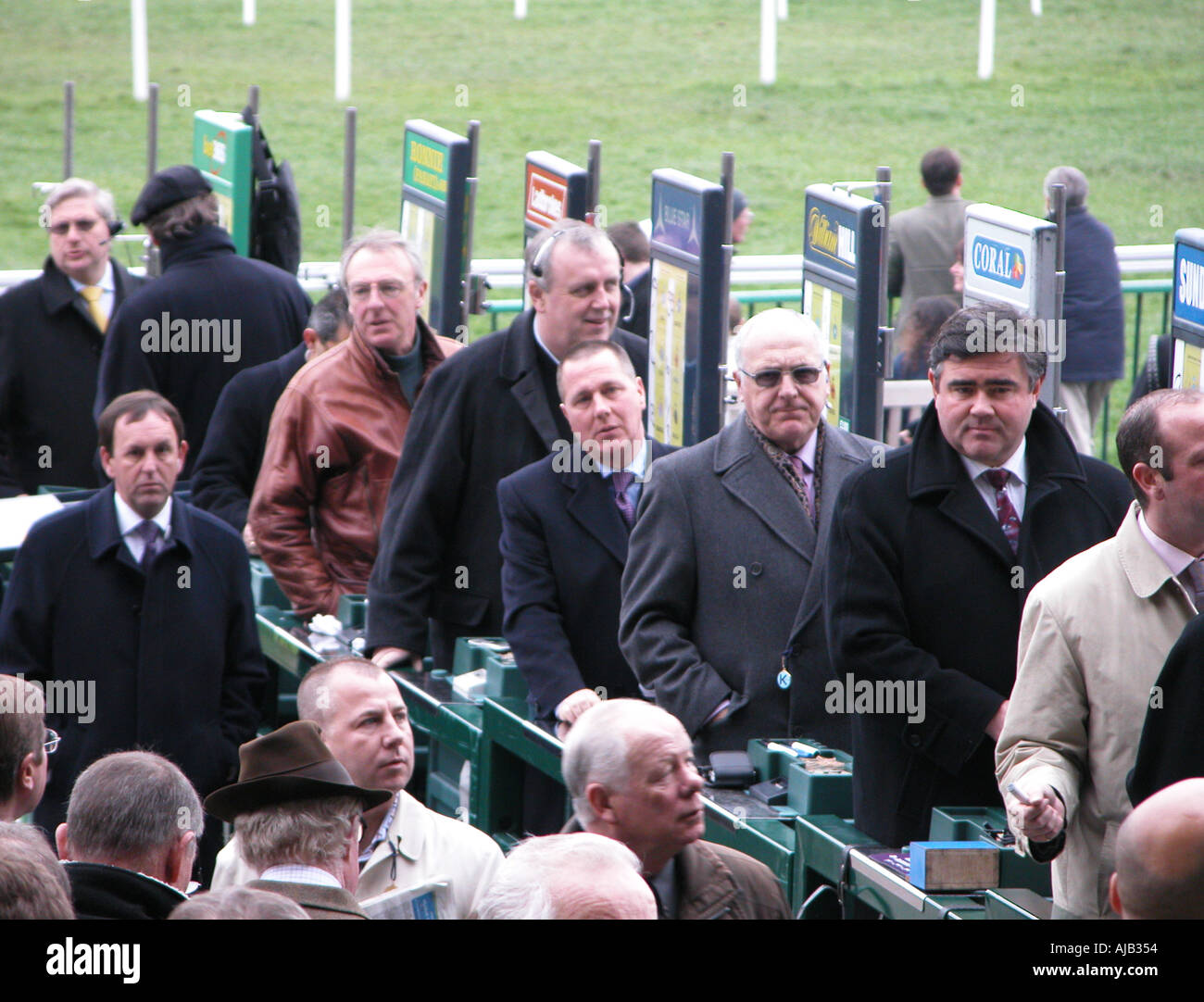 a line of bookmakers at the racecourse Stock Photo - Alamy
