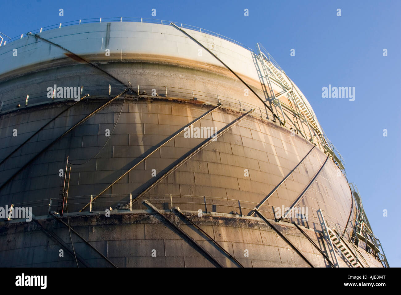 Gasworks telescopic gas tower Stock Photo - Alamy