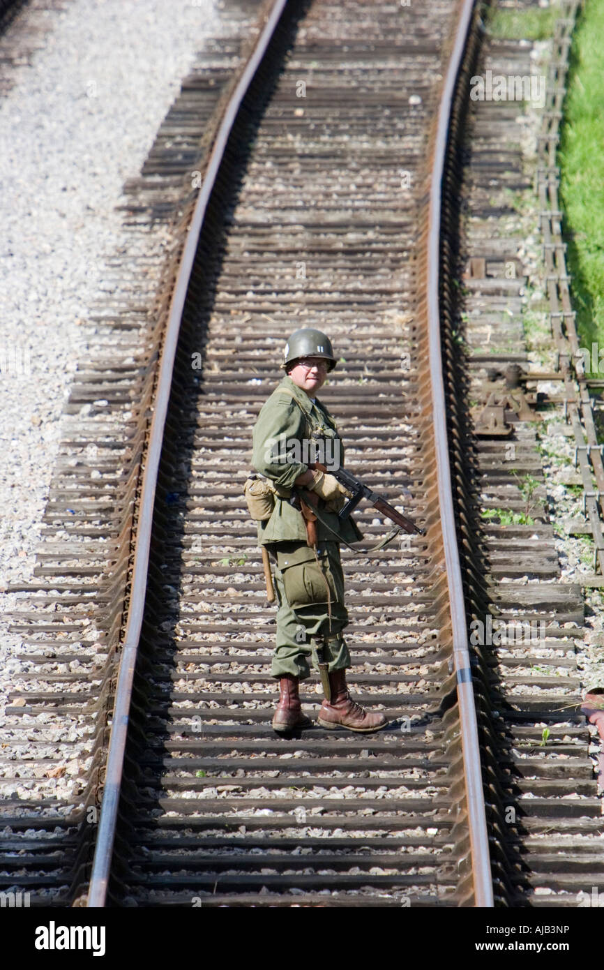 Soldiers on the railway lines taking part in WWII re enactment of ...