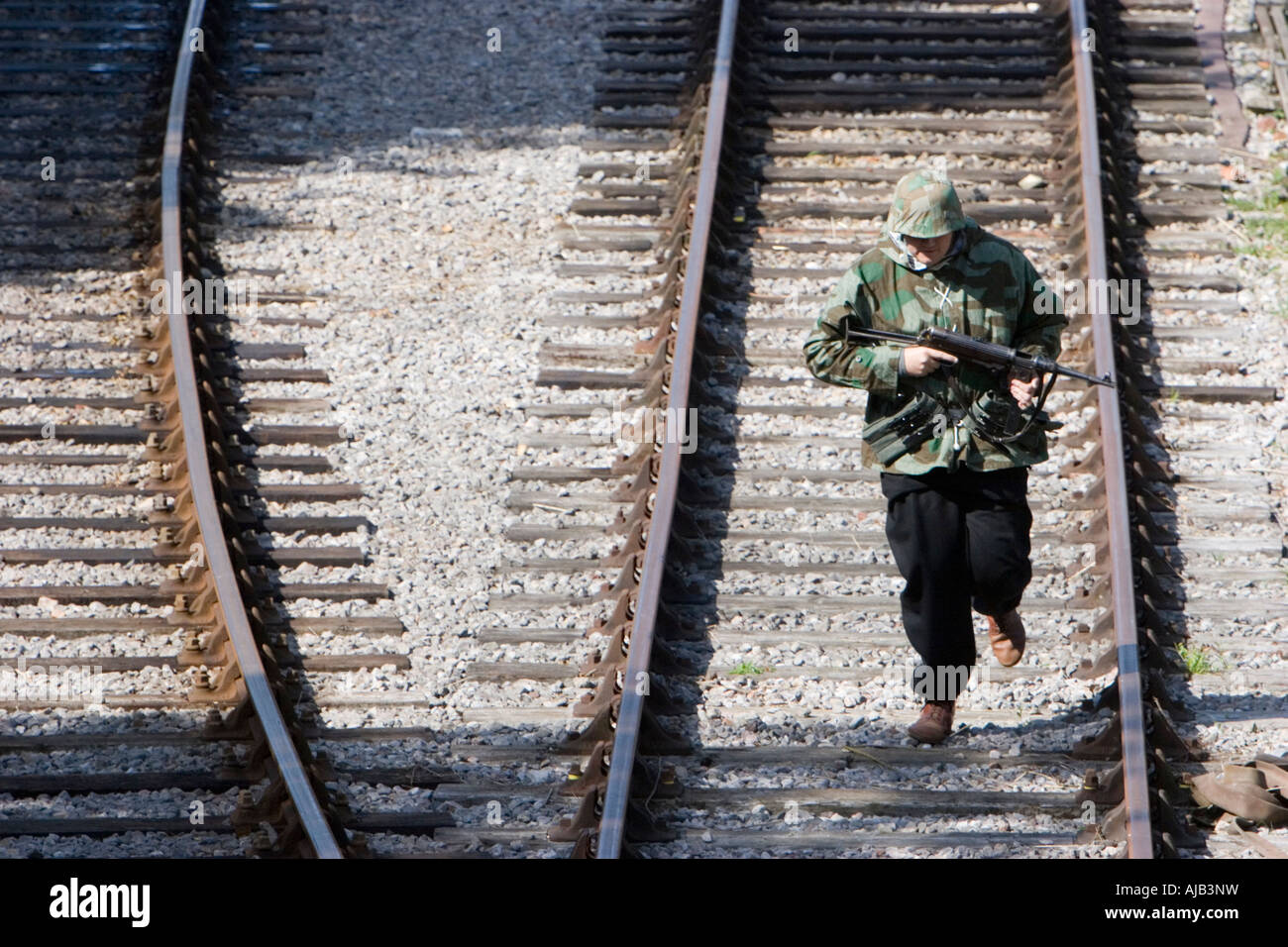 Soldiers on the railway lines taking part in WWII re enactment of ...