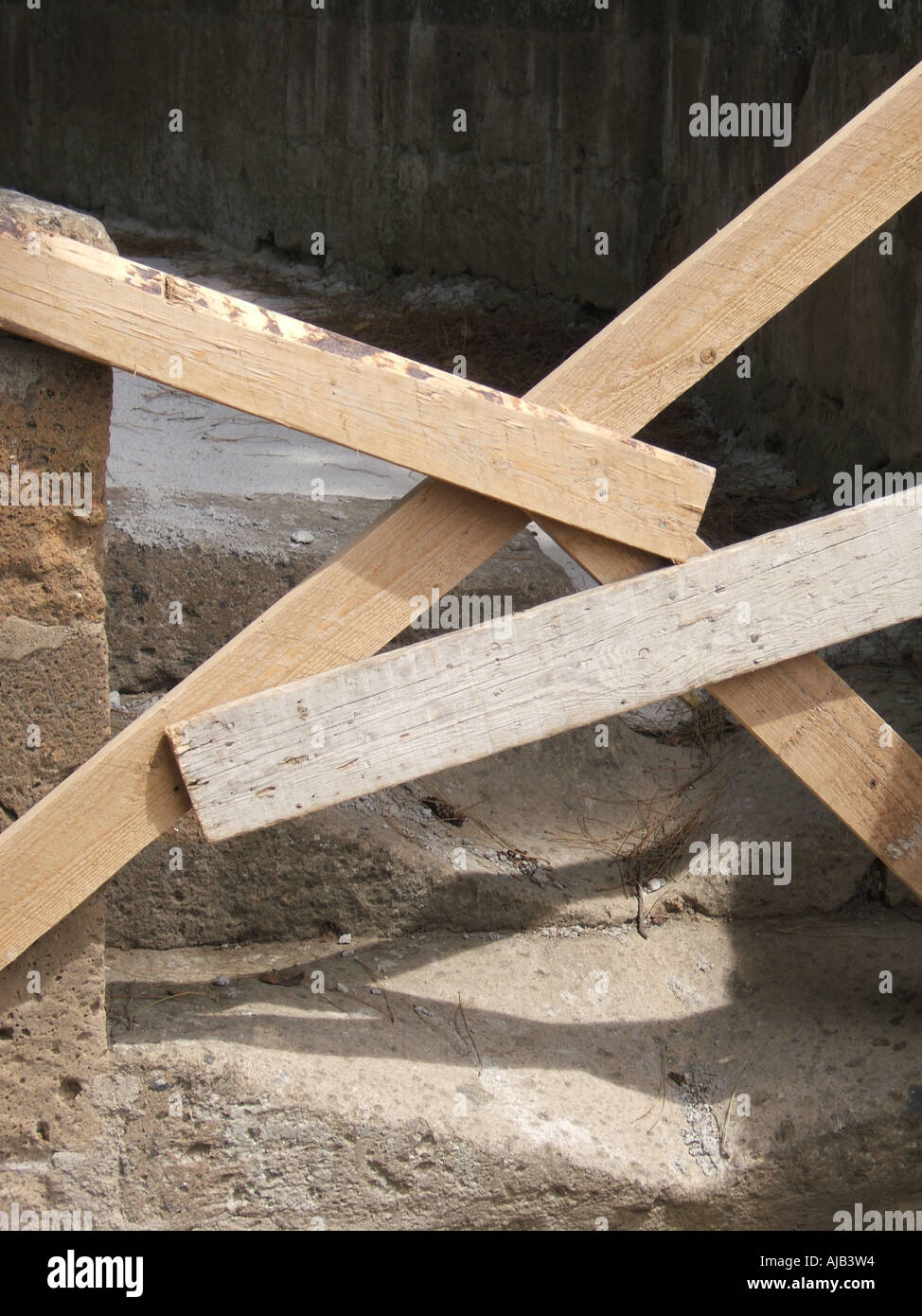 improvised temporary barrier made with planks of wood Stock Photo - Alamy