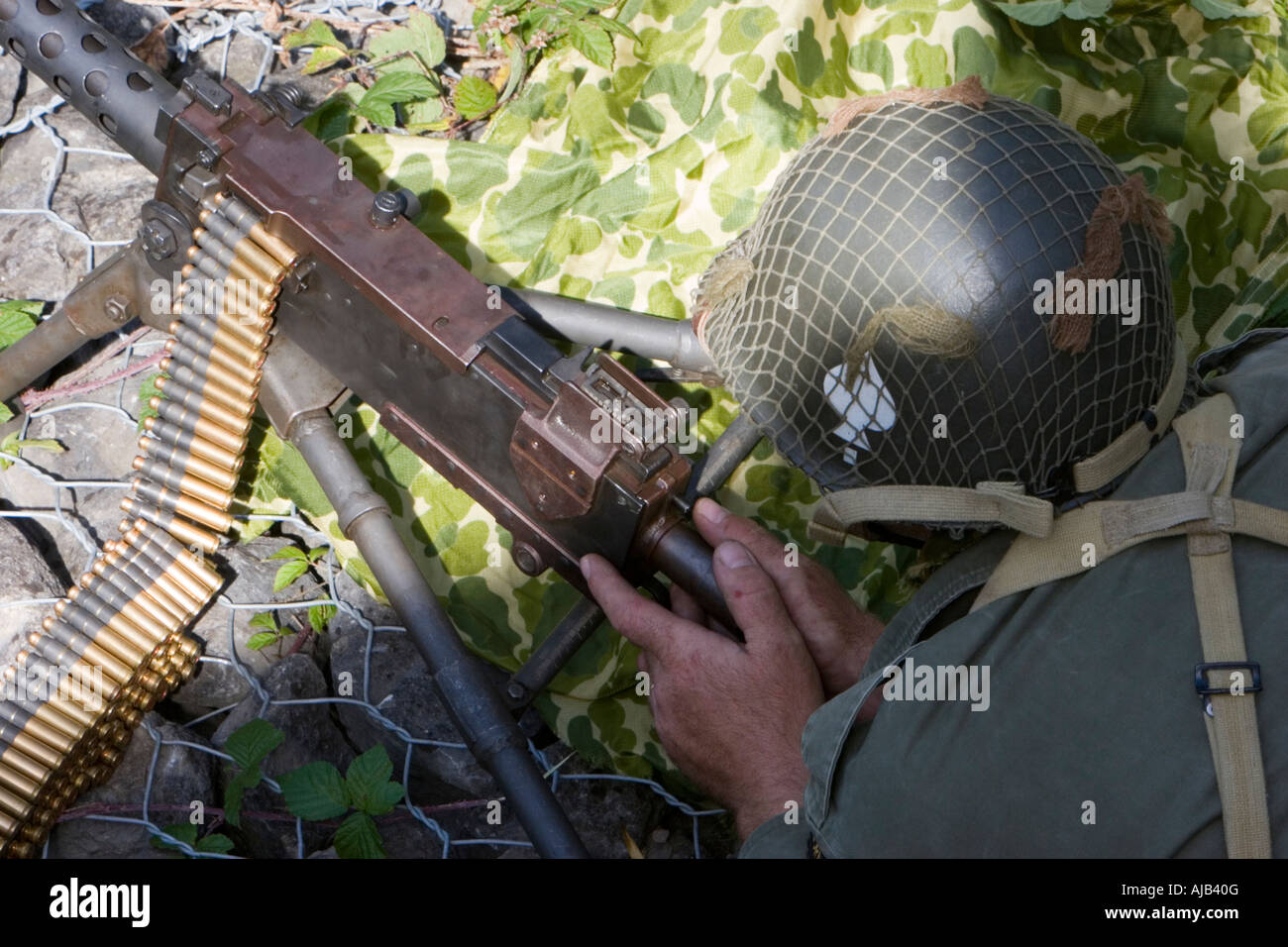 Soldier in machine gun position World War II battle re enactment Stock ...