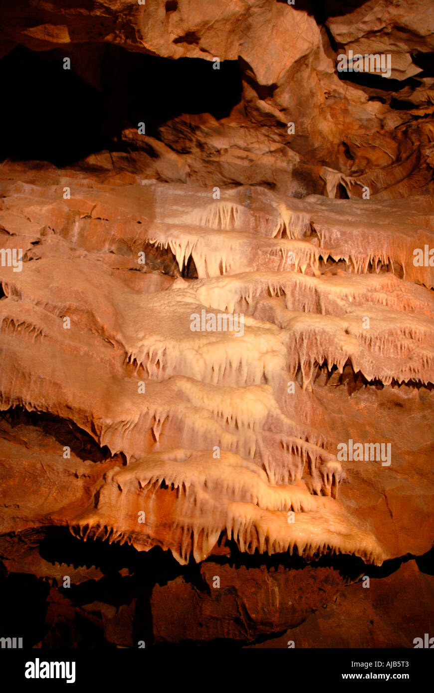 Underground rock formations of a waterfall, Cheddar Gorge Stock Photo ...