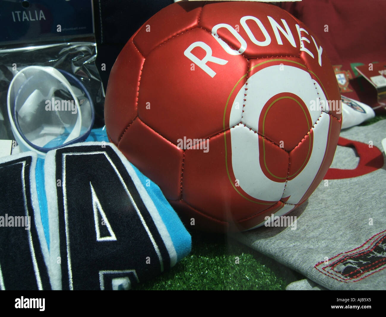 football merchandise in shop window Stock Photo - Alamy
