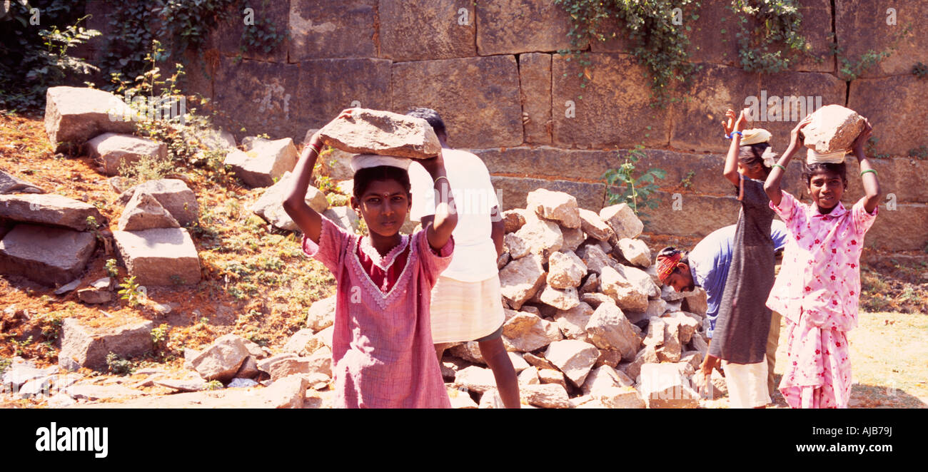 Children moving big stones hi-res stock photography and images - Alamy