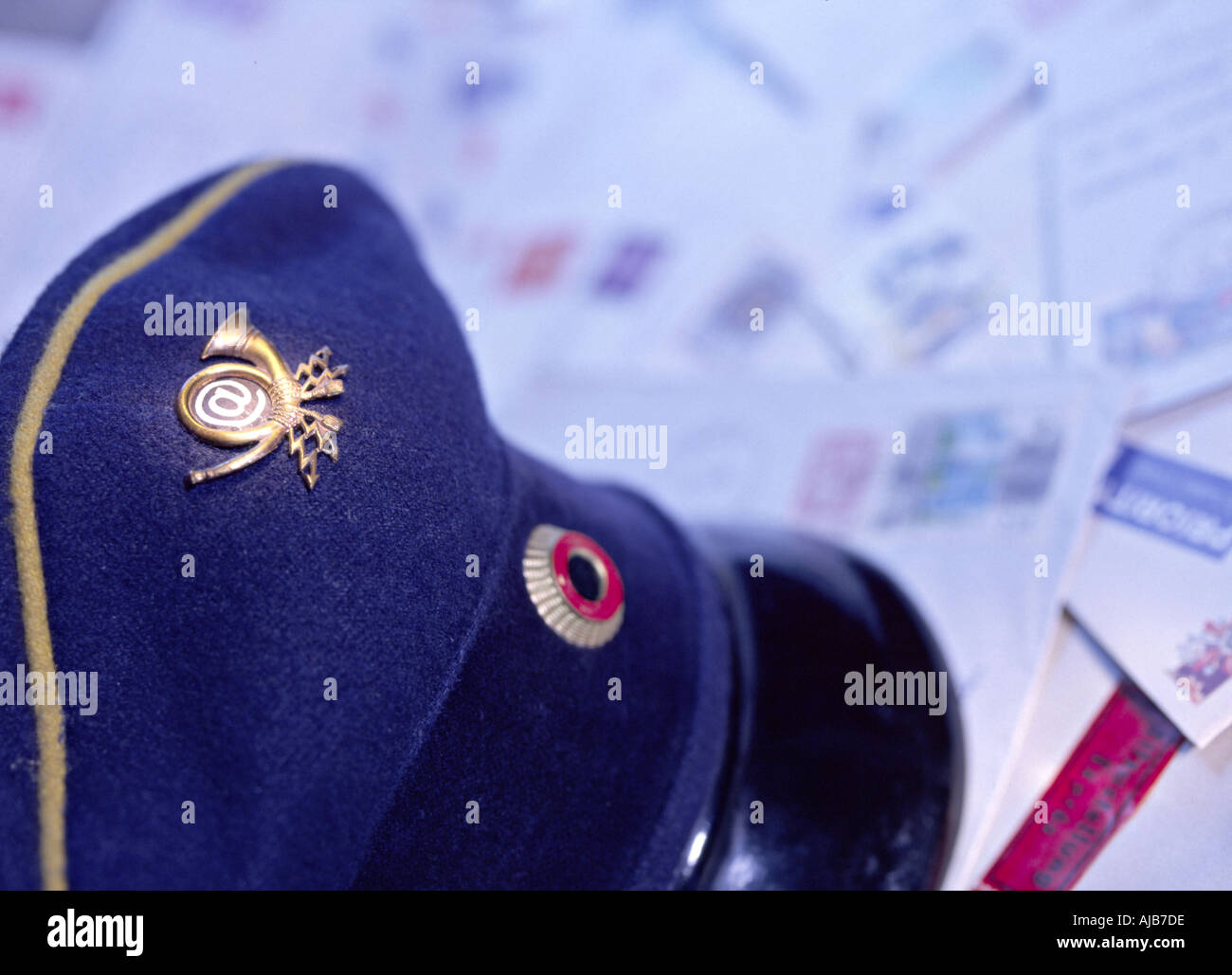 postman hat with sign and letters Stock Photo - Alamy