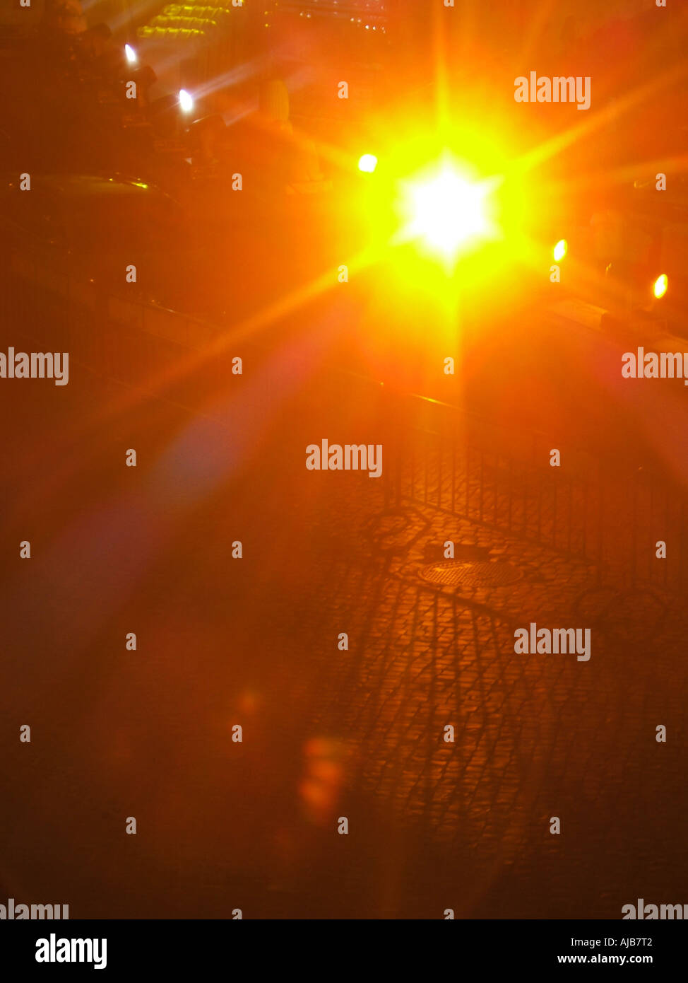 bright orange spotlight and dark background Stock Photo - Alamy