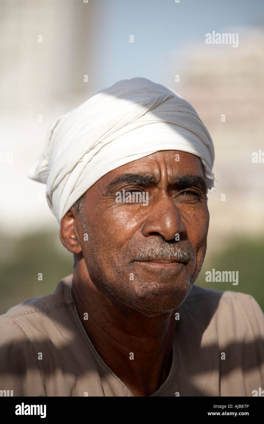 Egyptian boat man in traditional galibeya robe and turban Cairo Egypt ...