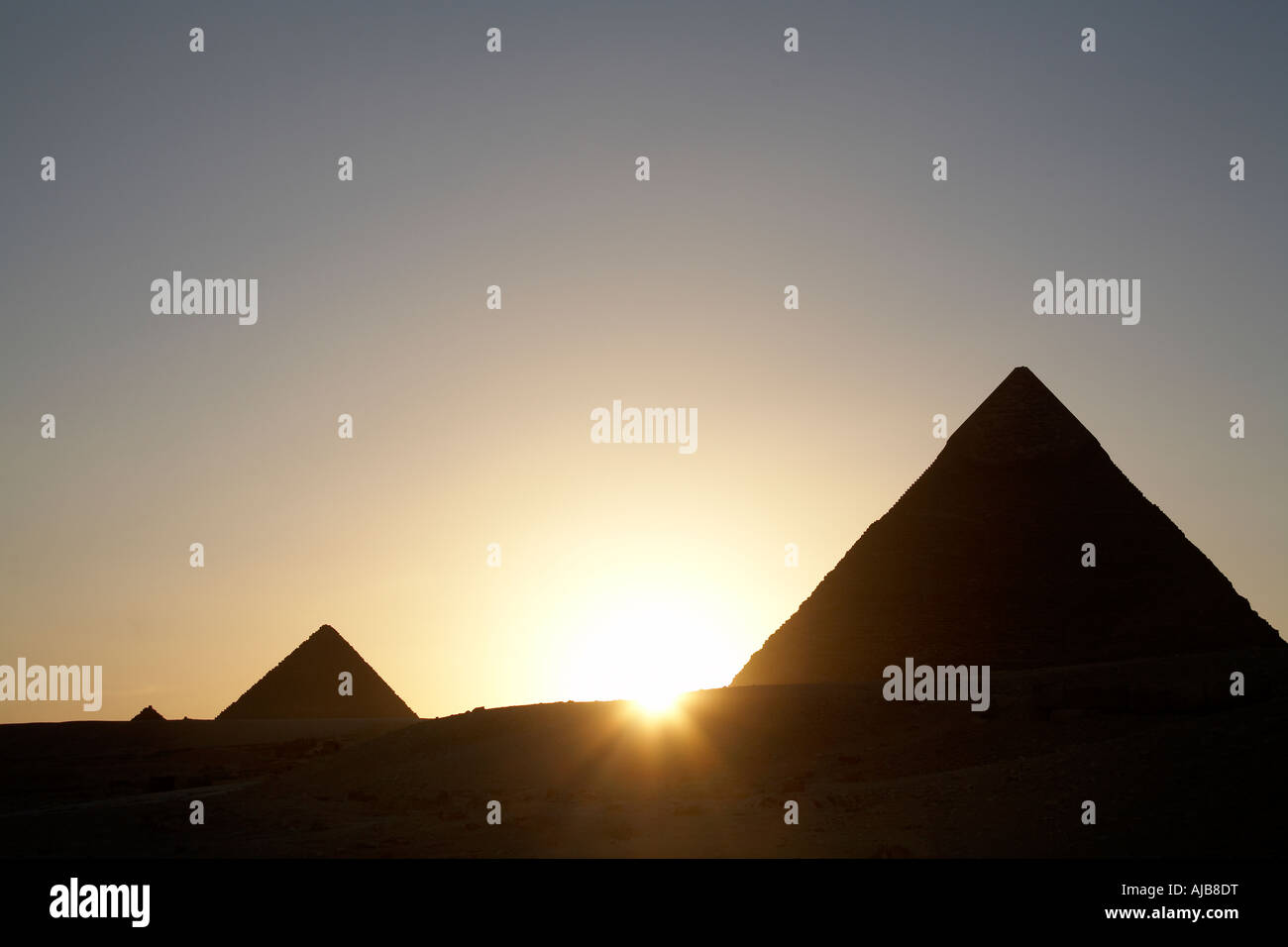 Pyramids of Khafre Chefren and Menkaure Mycerinus in setting sun ...