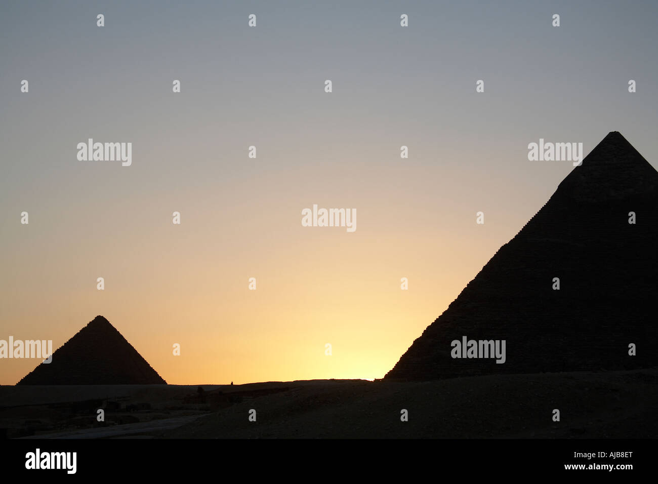 Pyramids of Khafre Chefren and Menkaure Mycerinus in setting sun ...