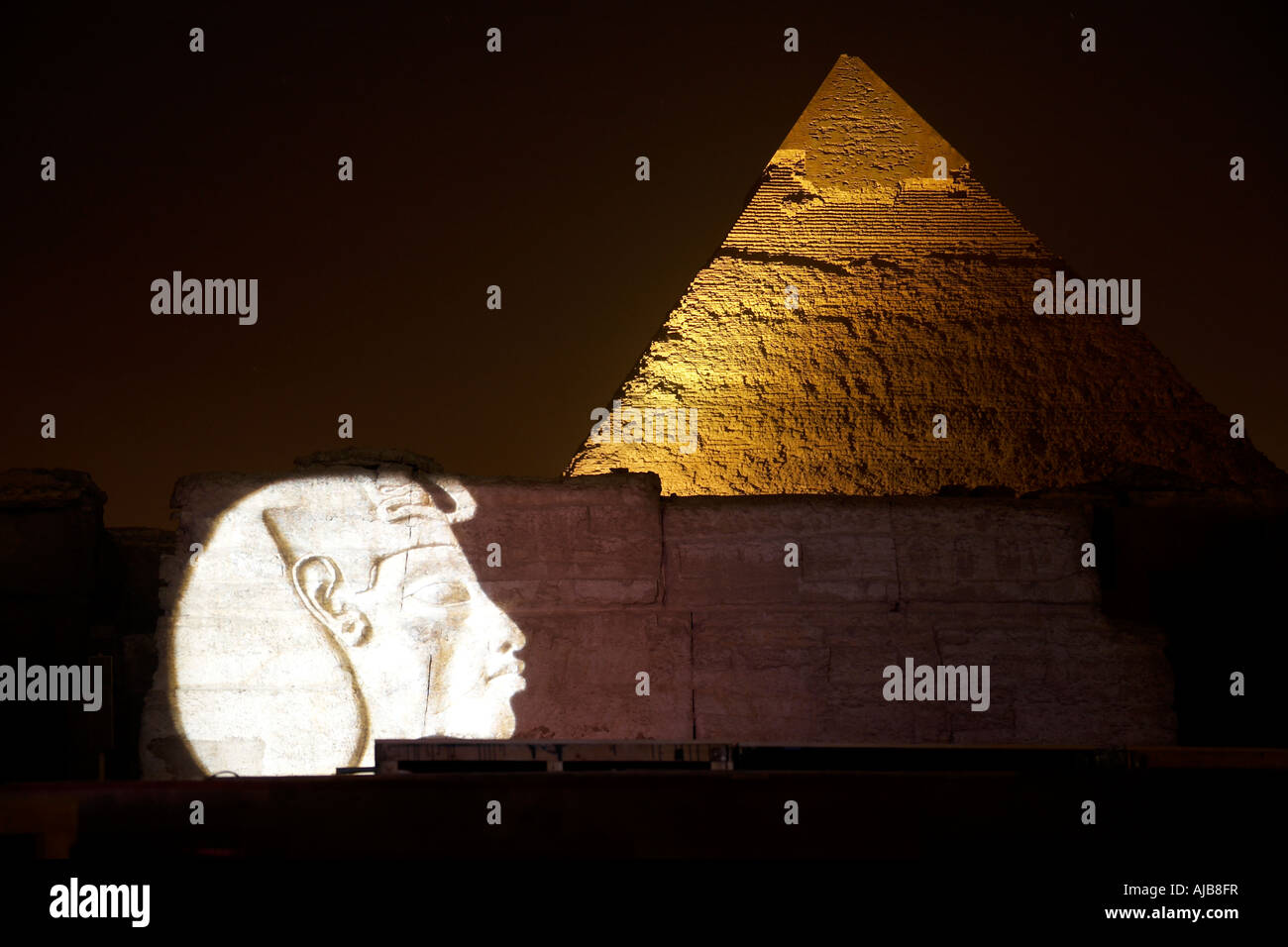 Pyramid of Khafre Chefren and ruins illuminated during dramatic evening ...