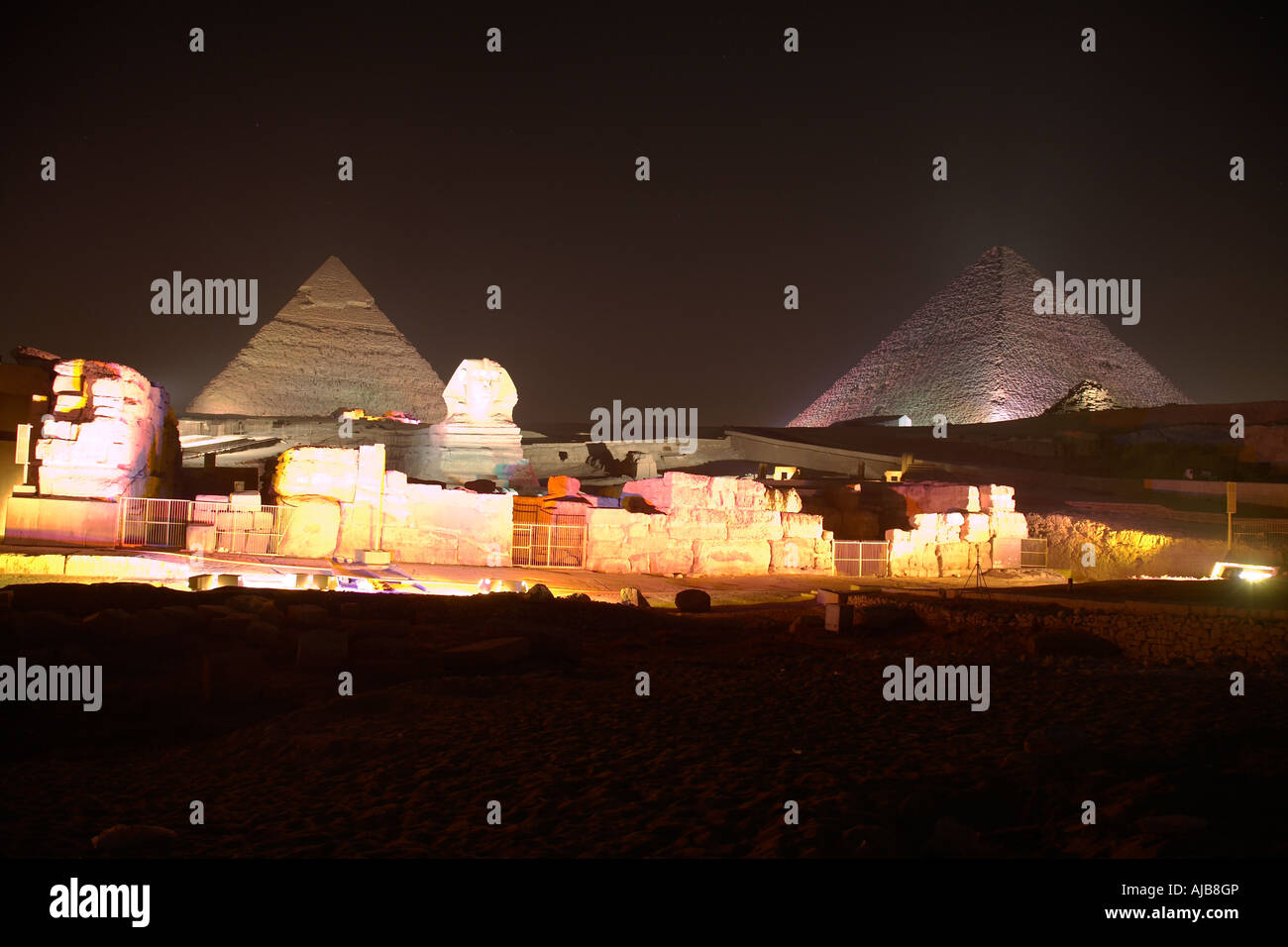 Pyramids and Sphinx illuminated during dramatic evening Son et Lumiere ...