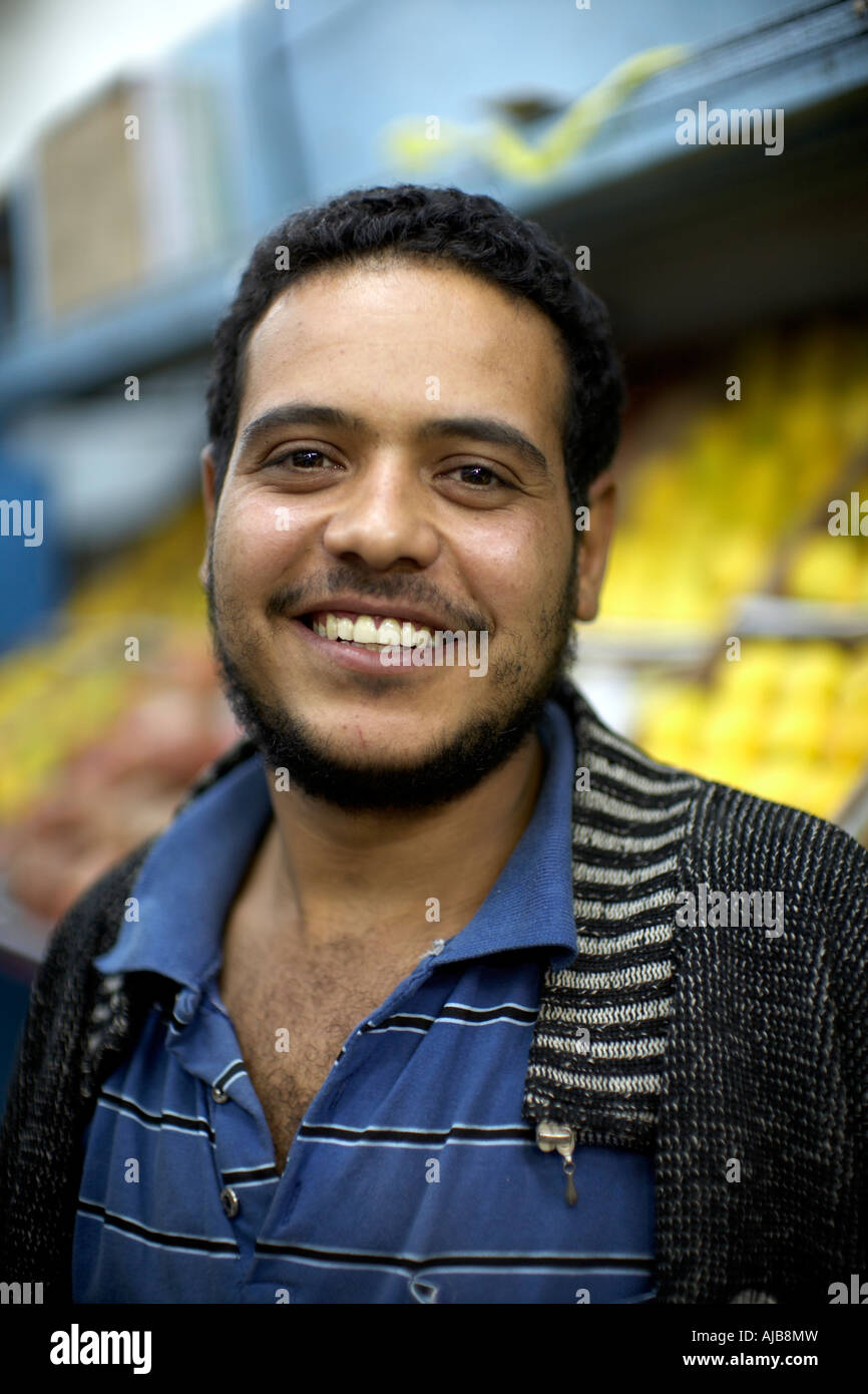 Young man smiling at night in Mohandiseen area Cairo Egypt Africa Stock ...