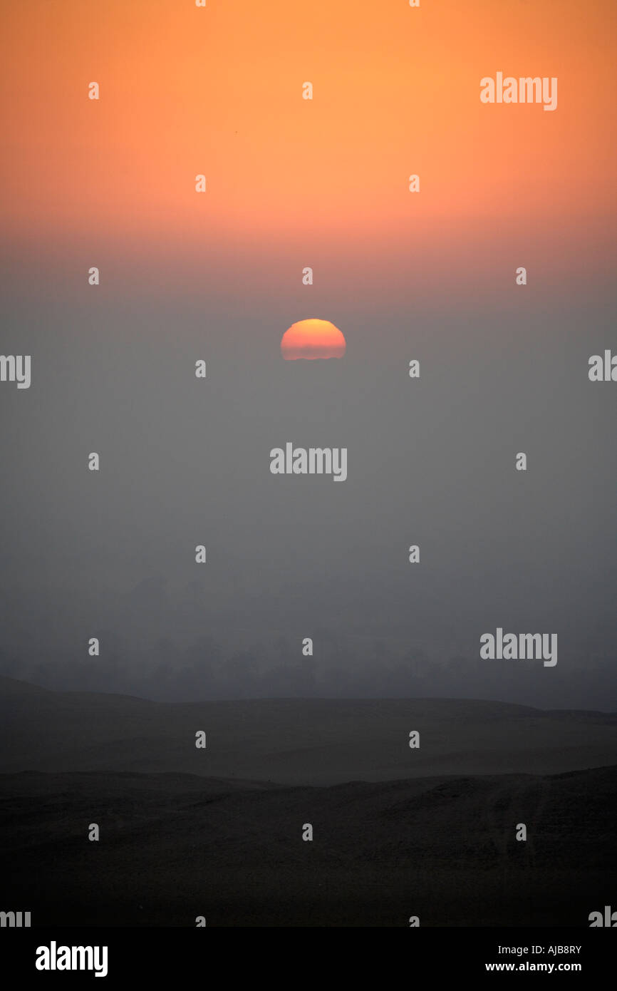 Surise over City centre in early morning dawn hazy mist from stony ...