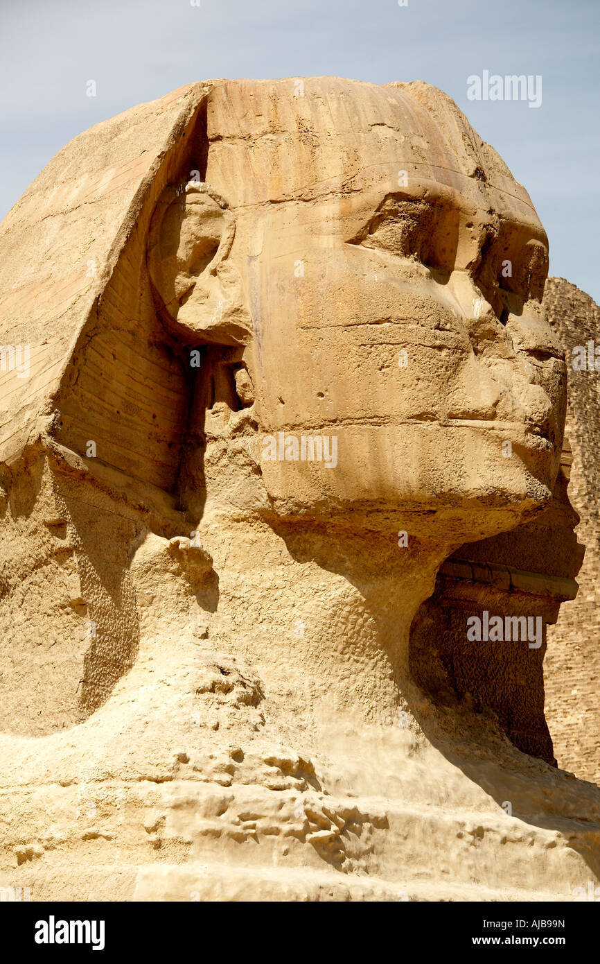 The Sphinx with Great Pyramid of Khufu Cheops in distance Giza Cairo ...