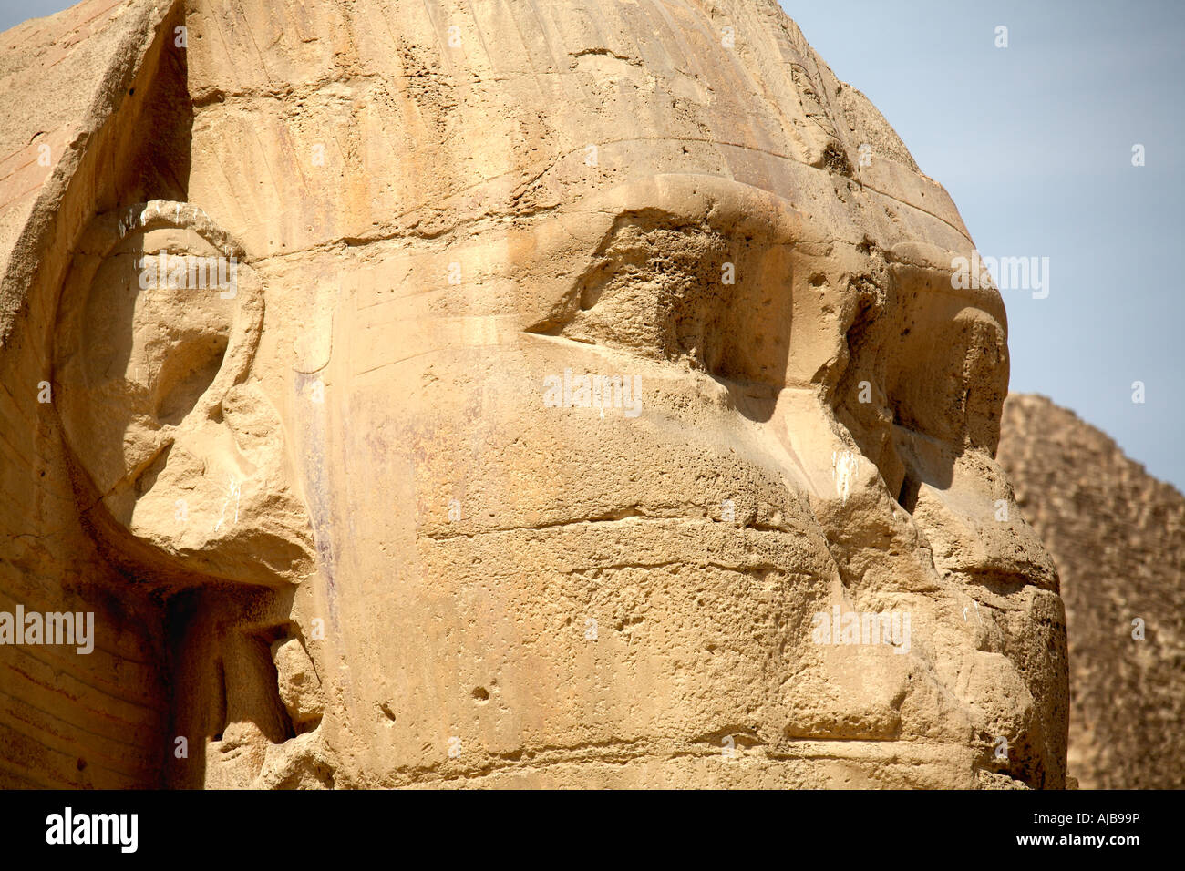 The Sphinx with Great Pyramid of Khufu Cheops in distance Giza Cairo ...