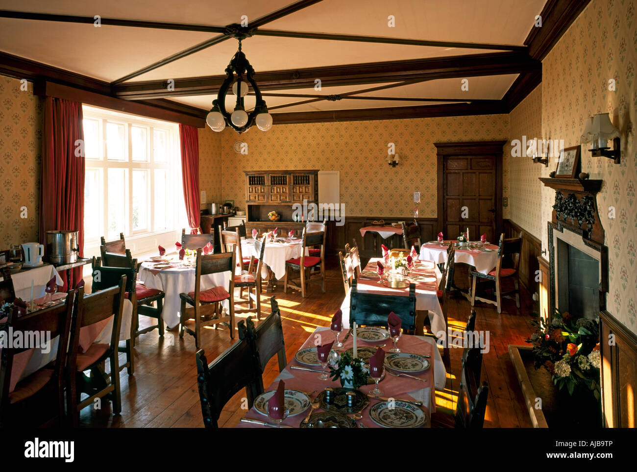 Pub restaurant dining room interior with tables laid England HXXZsm ...