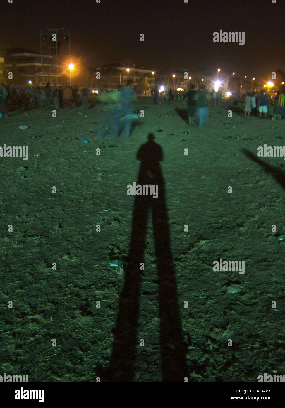 shadow of man in field at night Stock Photo - Alamy
