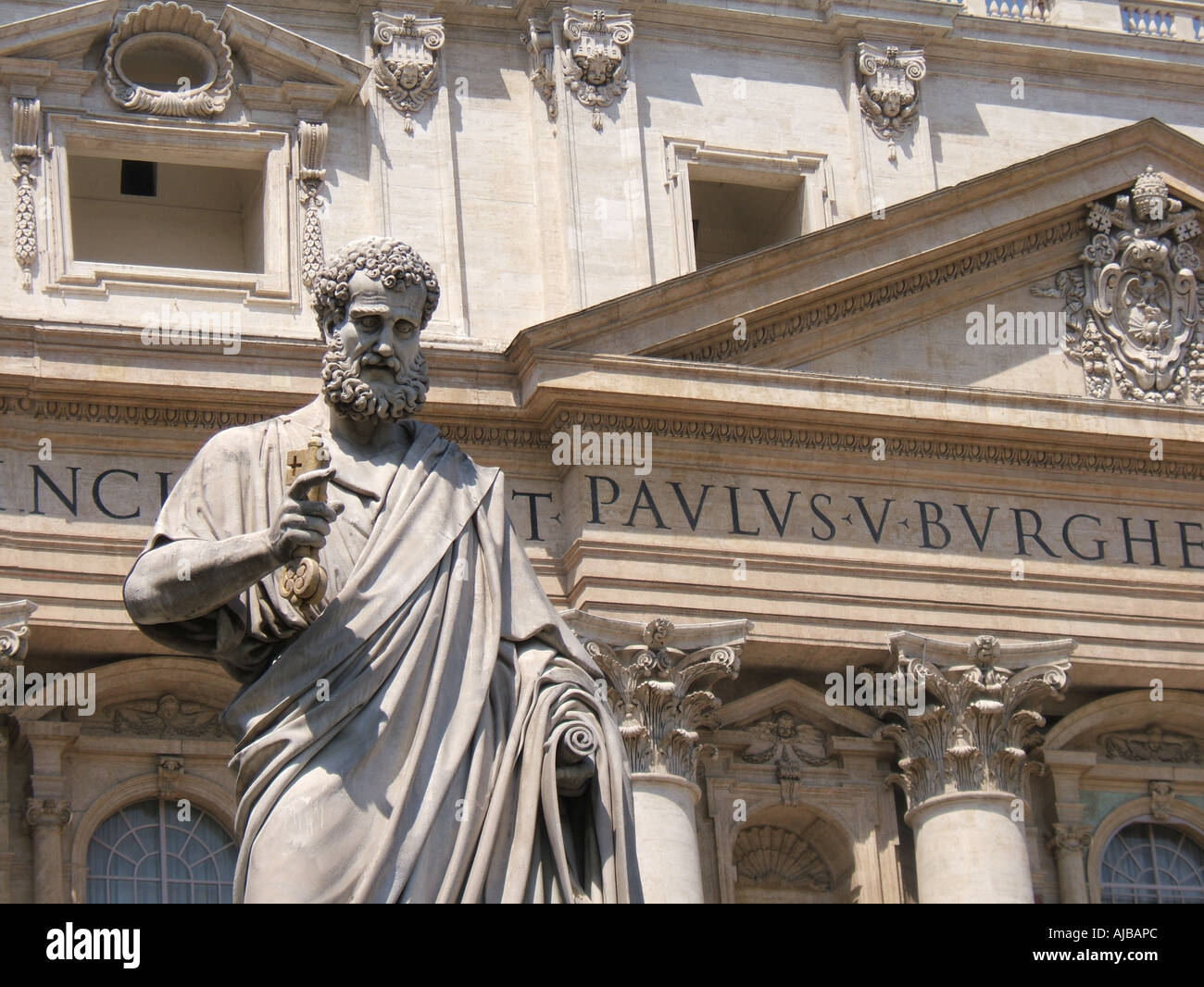 st peter statue and basilica facade in st peter's square, rome Stock ...