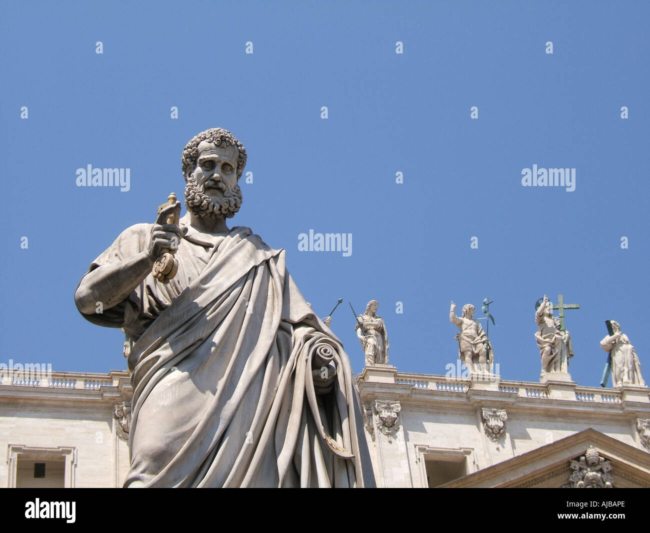 st peter statue and basilica facade in st peter's square, rome Stock ...