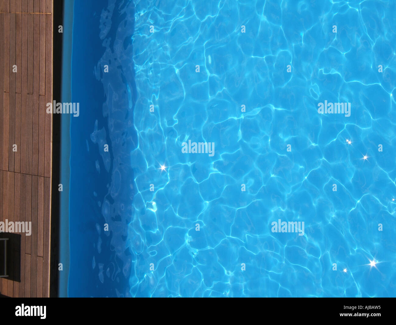 empty swimming pool with wooden boards Stock Photo - Alamy