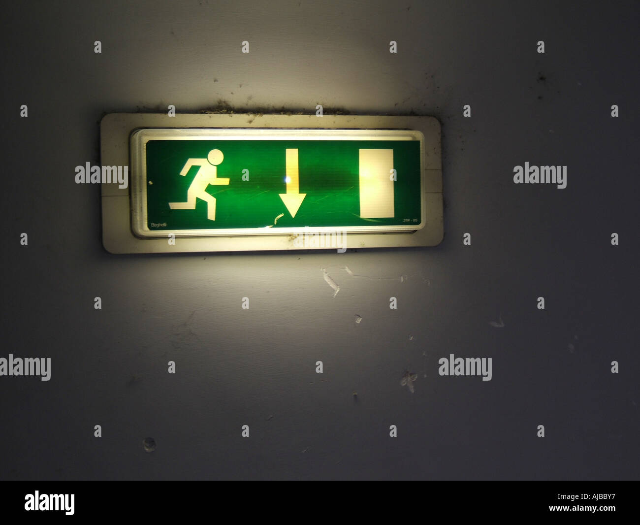 emergency exit sign in dark room Stock Photo - Alamy