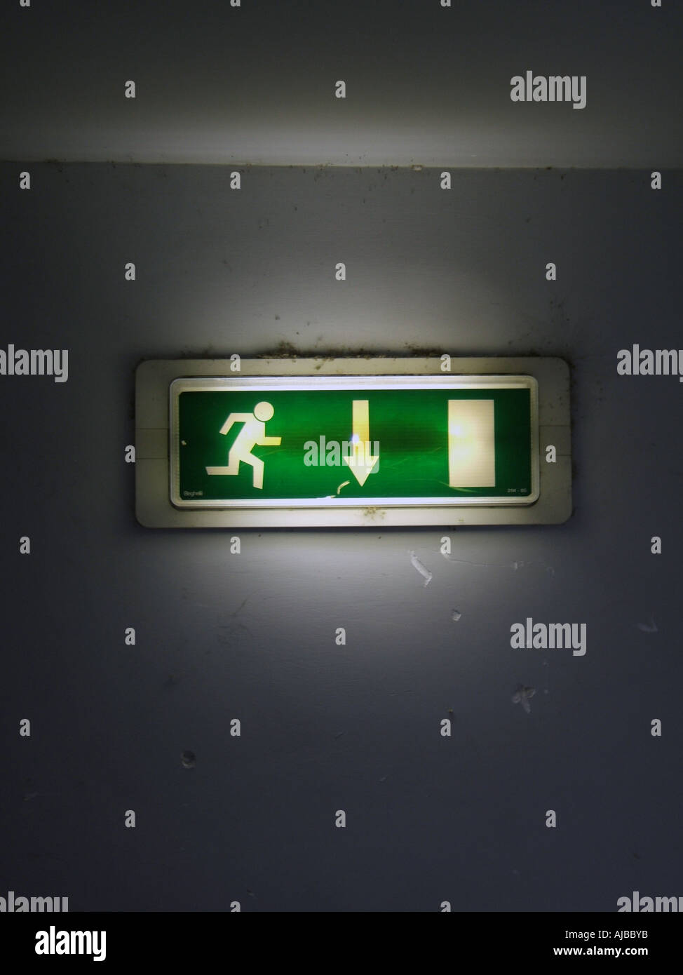 emergency exit sign in dark room Stock Photo - Alamy