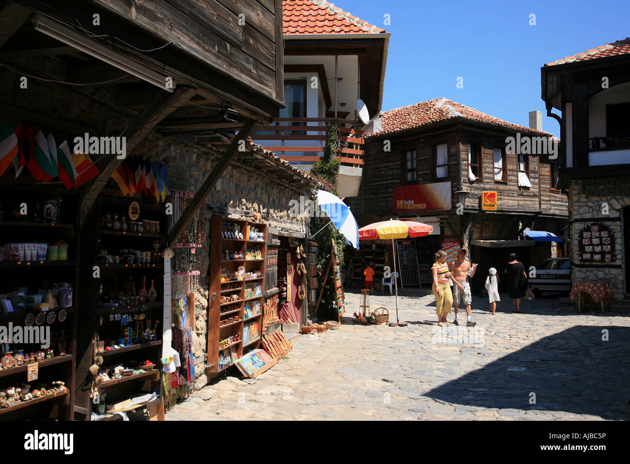 Shops and traditional wooden houses in the streets of the old town of ...