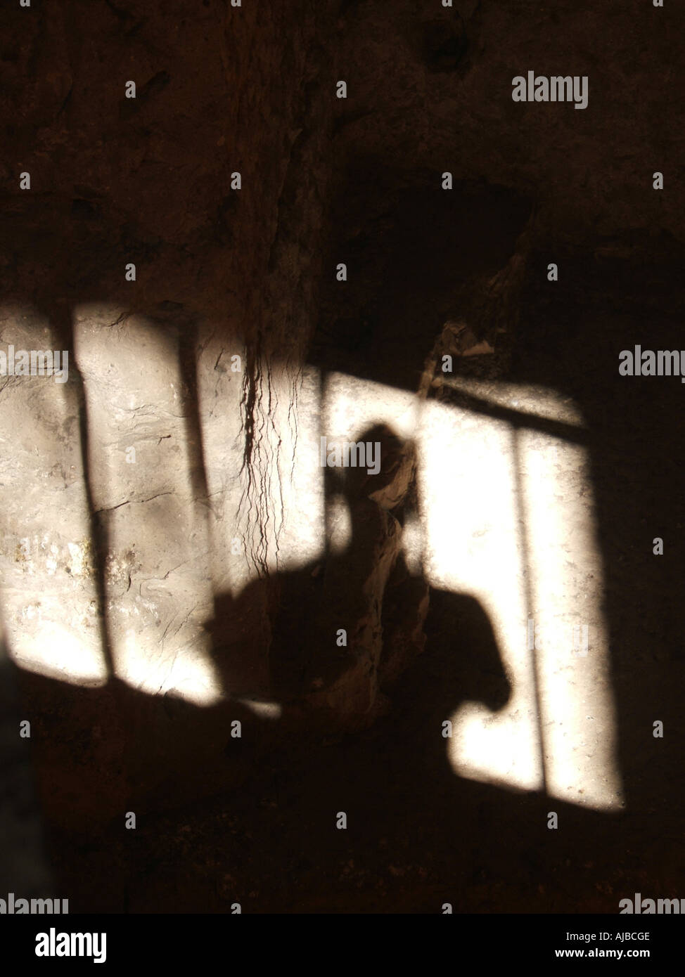 shadow of window with bars Stock Photo - Alamy